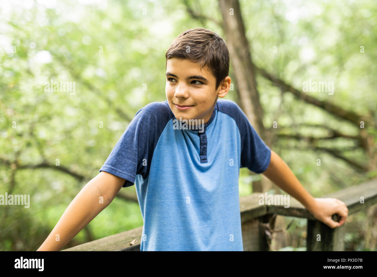 Portrait of a boy outdoors in the forest Stock Photo - Alamy