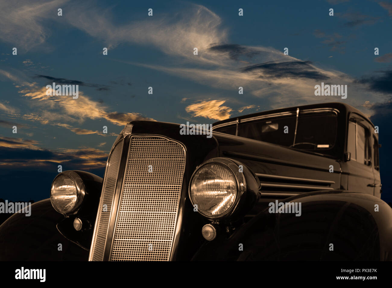 Vintage, black, shiny car against the background of the night sky Stock ...