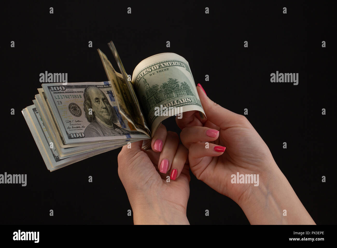 Hand giving money, United States Dollars or USD. Hands holding ...
