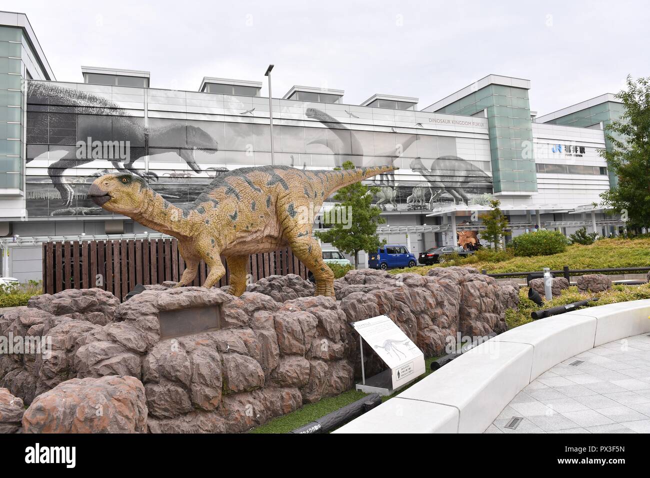 A dinosaur monument stands in front of Fukui Station in Fukui City ...
