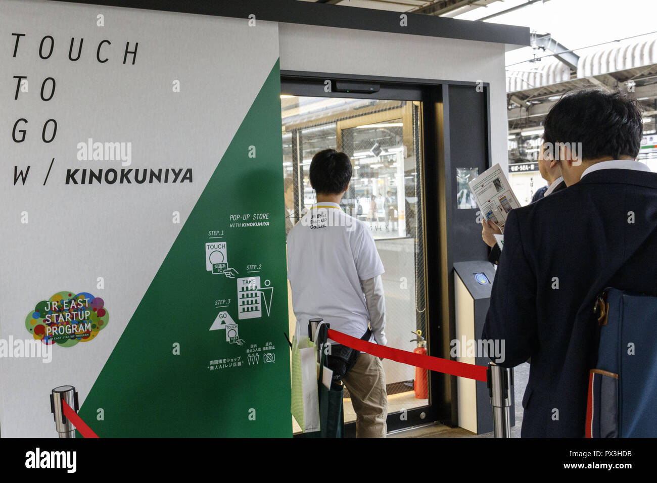 October 19, 2018 - Tokyo, Japan - Commuters line up to buy products in ...