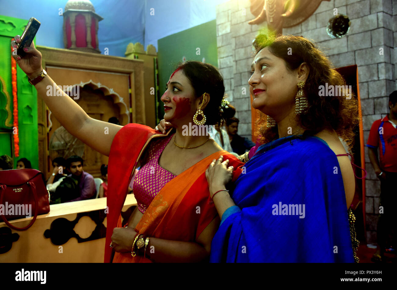 A woman seen taking a selfie with Sindur in her face during the Sindur ...