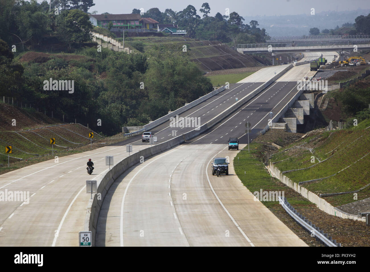 Bogor, West Java, Indonesia. 20th Oct, 2018. Vehicles pass on section I ...