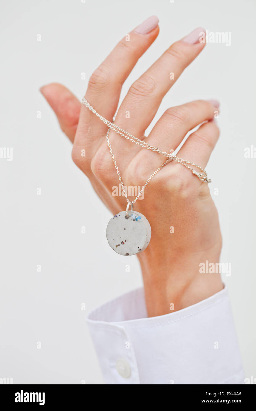 Holding necklace store