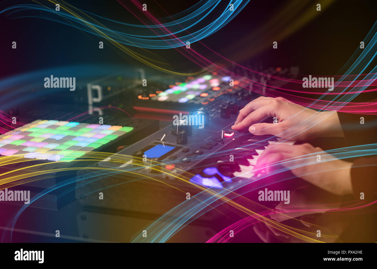 Hand mixing music on midi controller with colorful vibe concept Stock ...