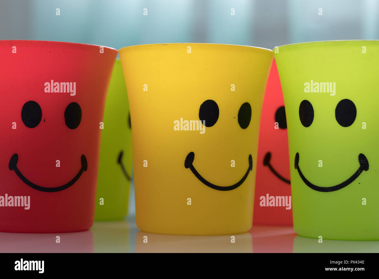 Plastic smiley cups hi-res stock photography and images - Alamy