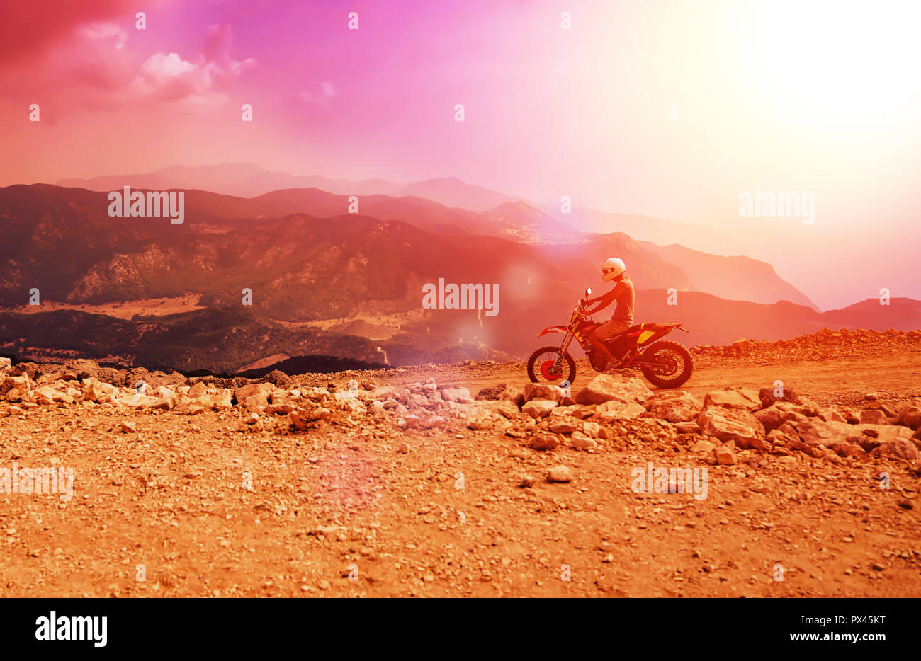 Mountain motor biker riding on dusty road on Babadag, Mugla/Turkey ...