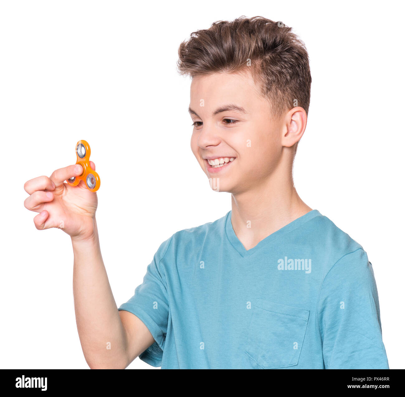 Teen boy with spinner Stock Photo - Alamy
