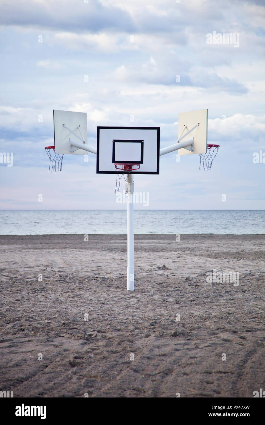three basketball hoops on the beach Stock Photo - Alamy
