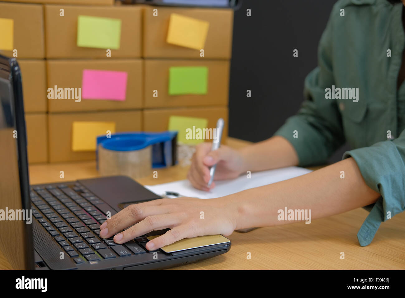 startup small business owner working with computer at workplace ...