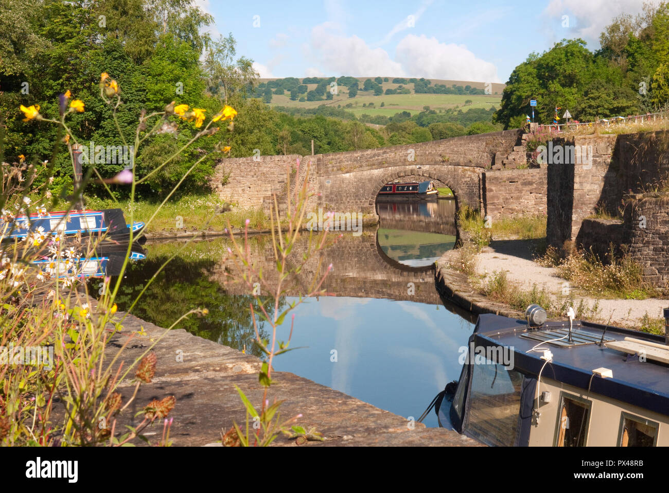 Narrowboats on the Peak Forest Canal, Bugsworth Basin at Buxworth near ...