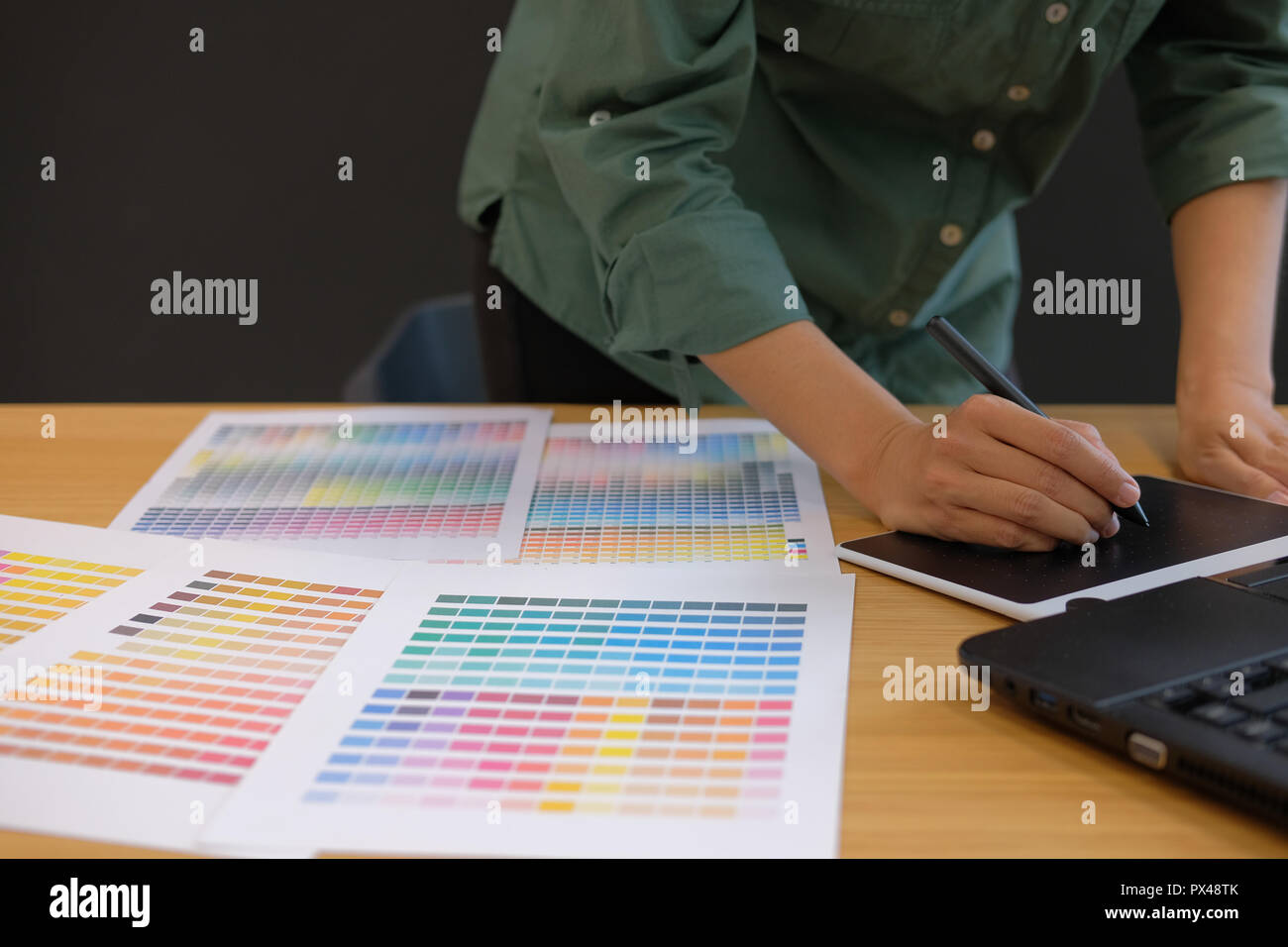 graphic interior designer working with computer. creative man drawing ...