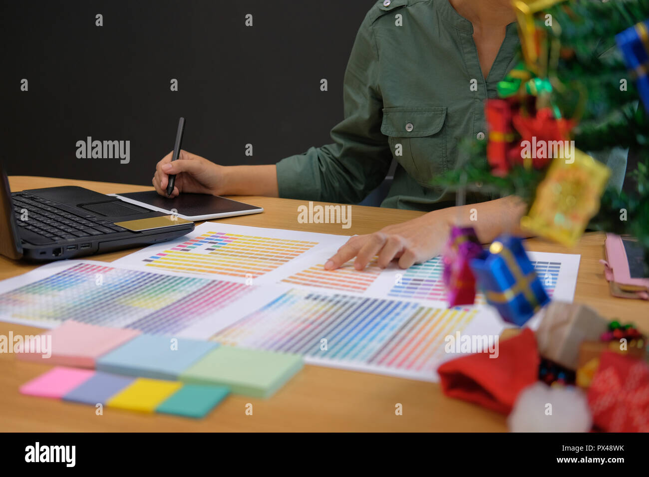 graphic interior designer choosing color from swatch sample. creative ...
