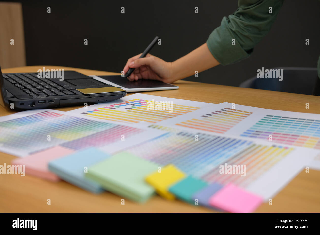 graphic interior designer working with computer. creative man drawing ...