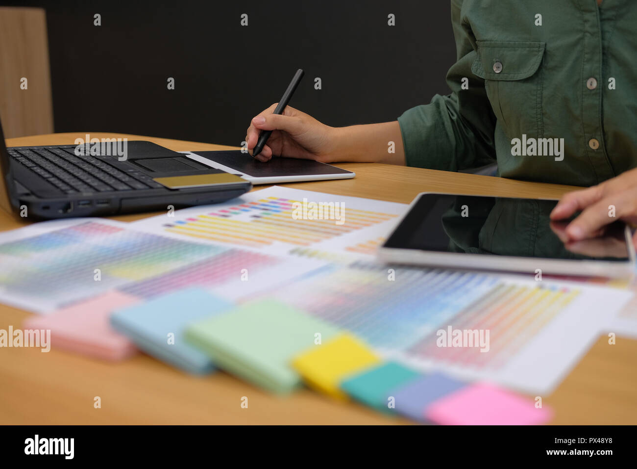 graphic interior designer working with tablet. creative man drawing ...