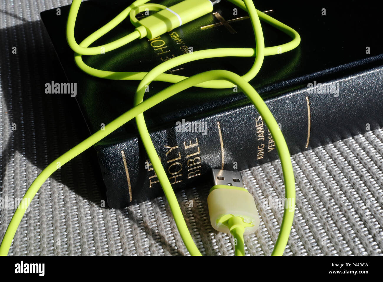 Paper Bible and digital Bible Stock Photo - Alamy