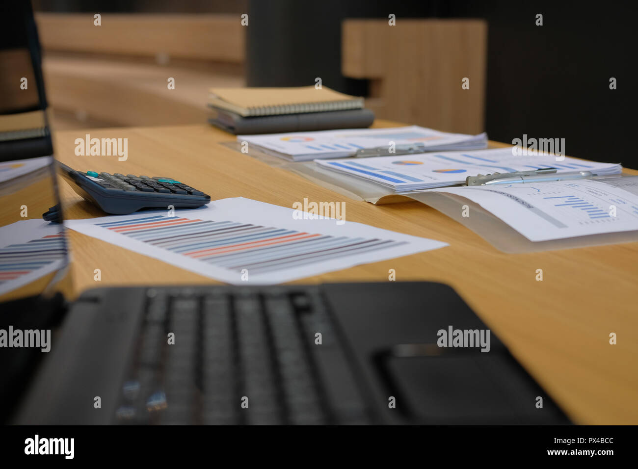 document computer on wood desk at office workplace. business workspace ...