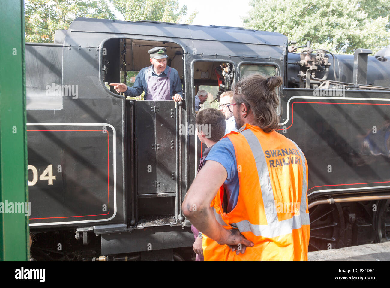 BR Standard Class 4 80104 steam locomotive train engine at platform of ...