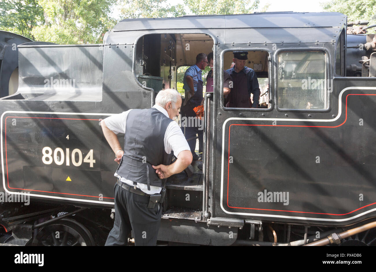 BR Standard Class 4 80104 steam locomotive train engine at platform of ...