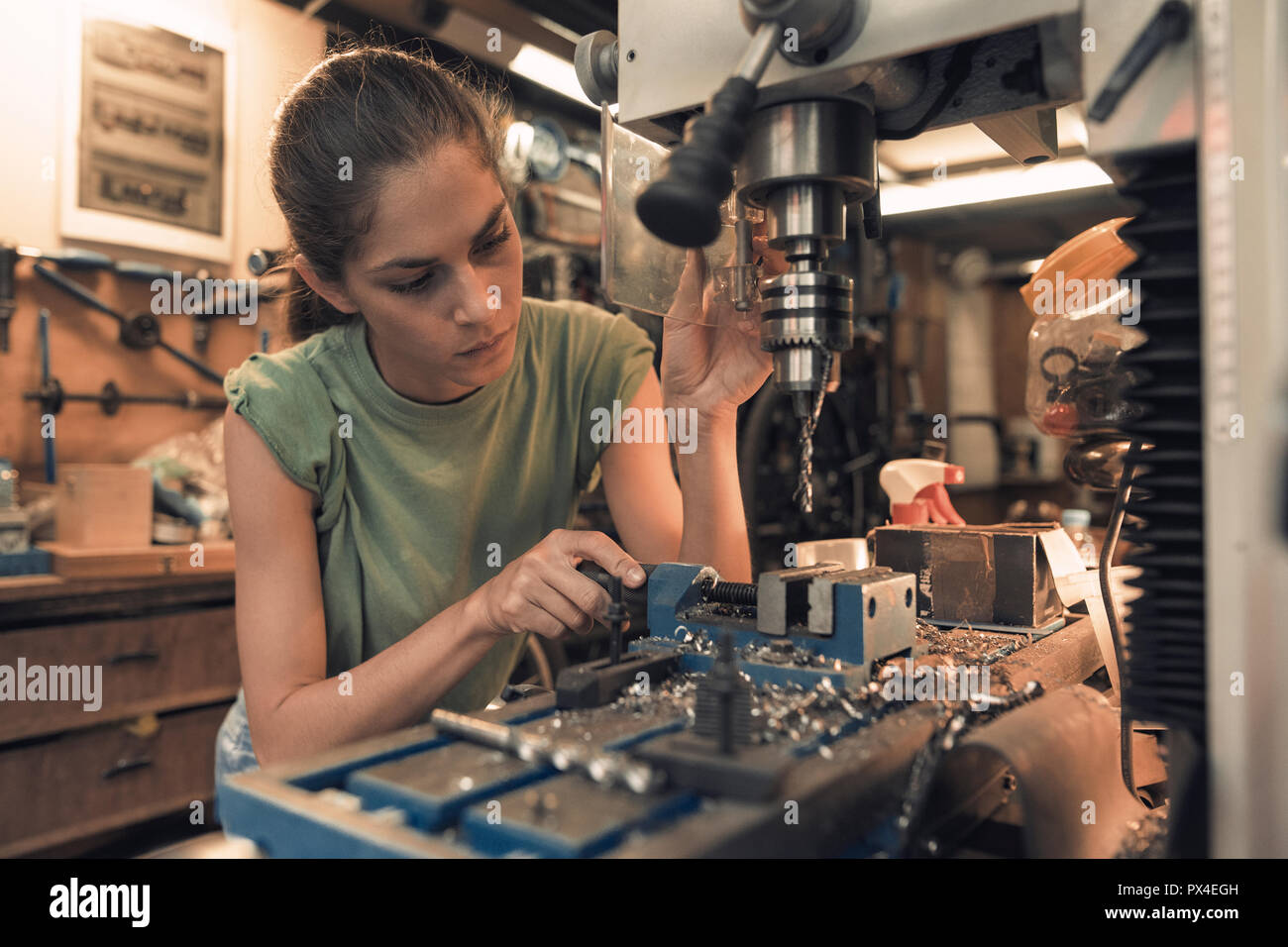 Woman using training machine hi-res stock photography and images - Alamy