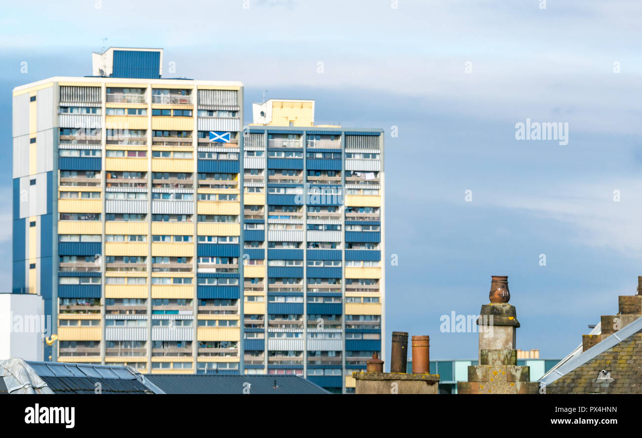 Council social housing tower block with saltire Scottish flag displayed ...