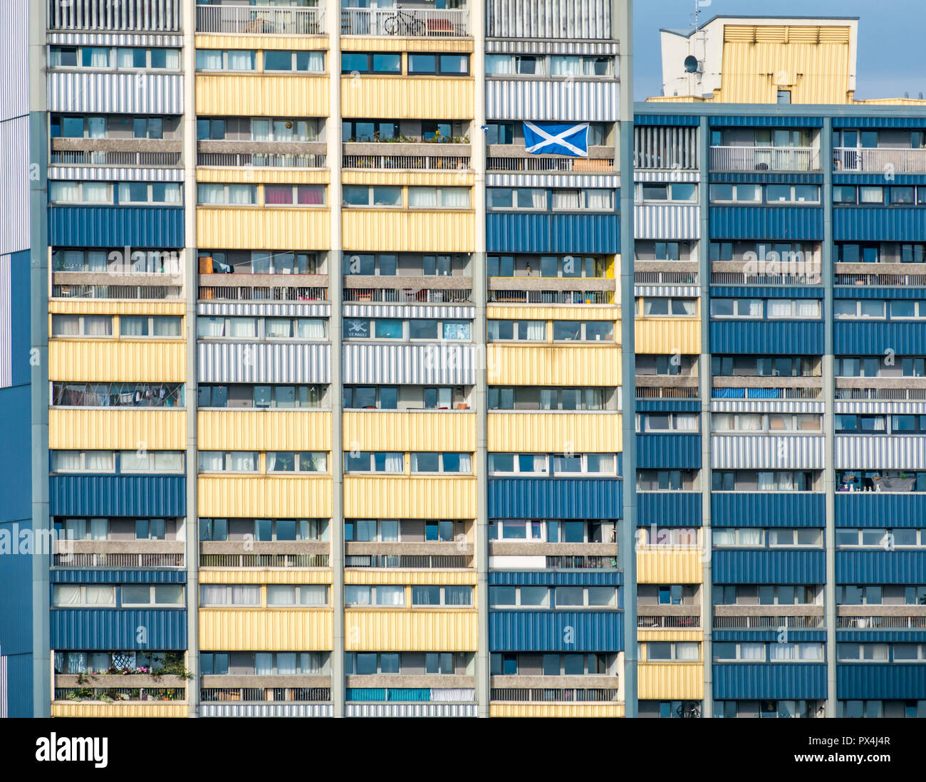 Council social housing tower block with saltire Scottish flag displayed ...