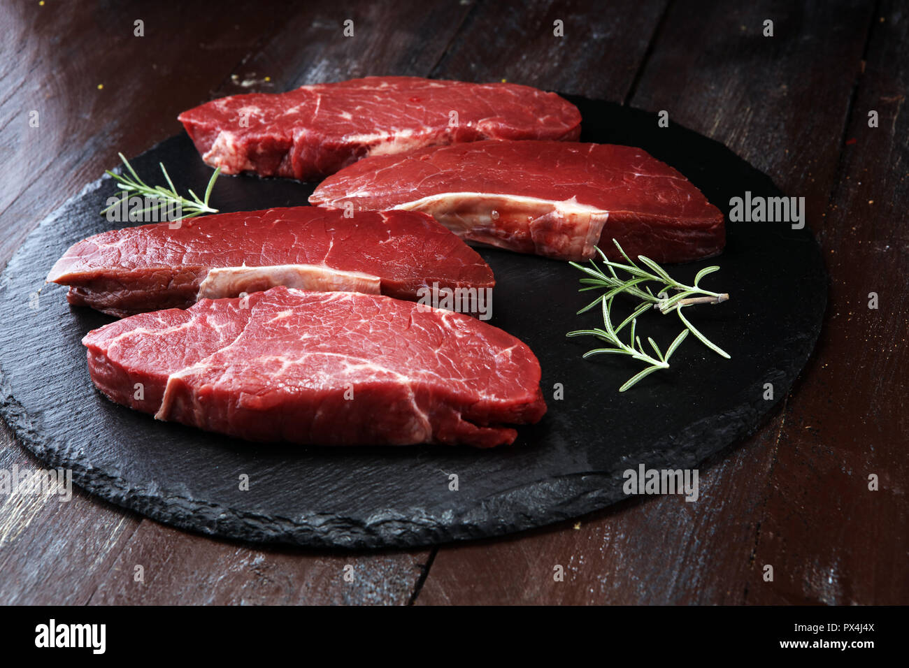 Barbecue rump Steak, dry Aged Steak on rustic background Stock Photo ...