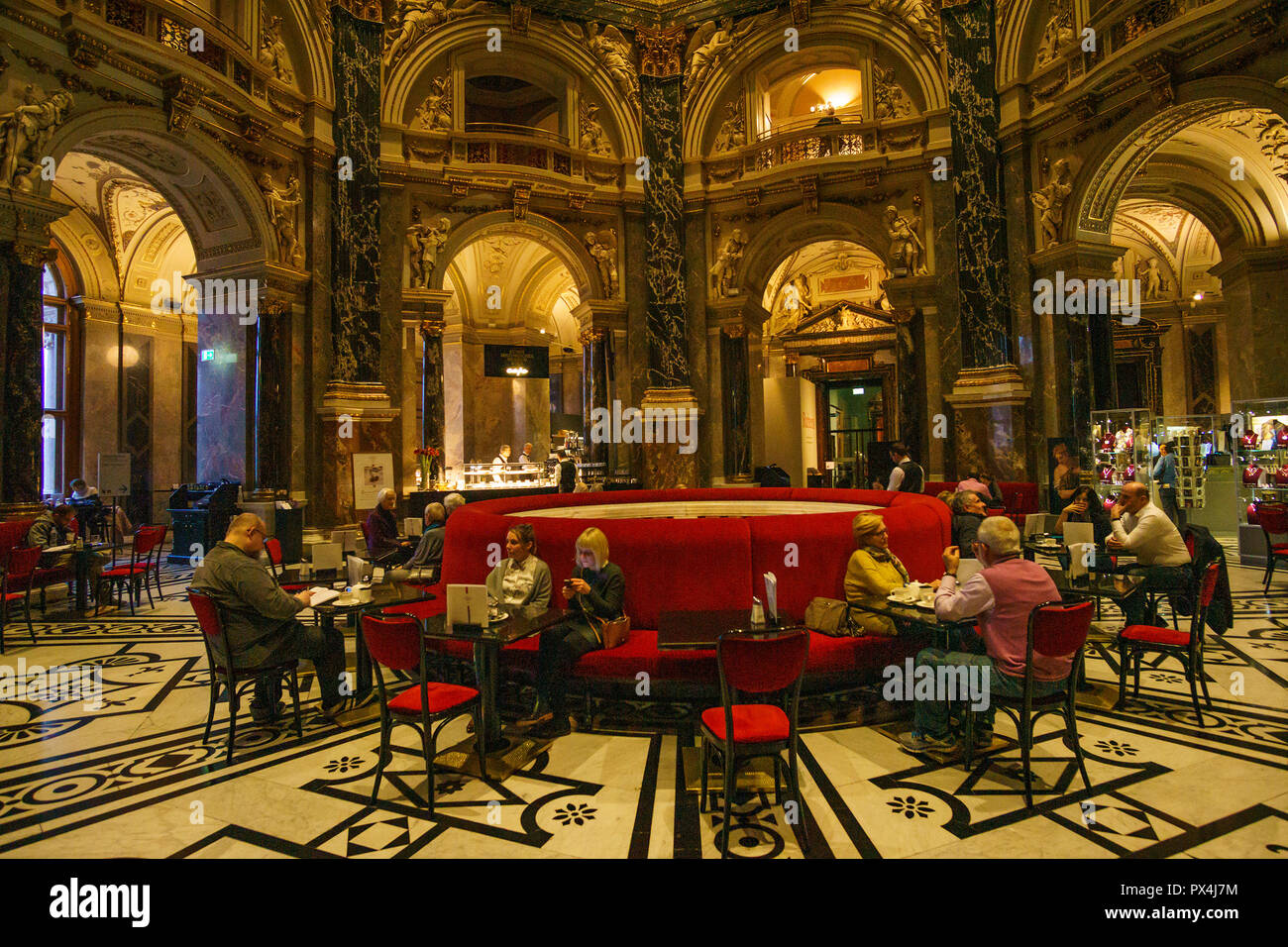 Tourists and visitors relaxing and drinking inside the ancient bar of ...