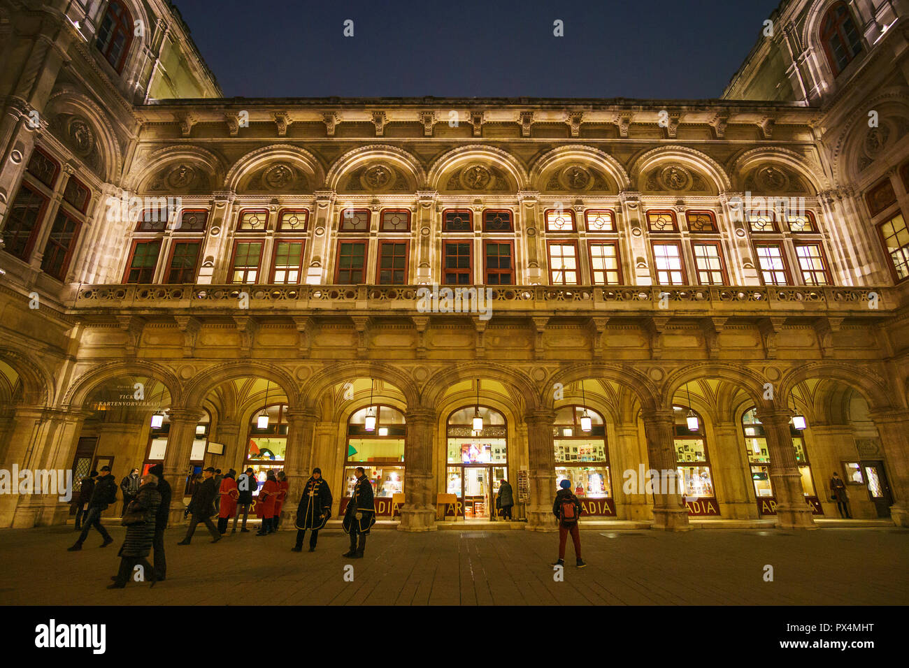 The famous State Opera with tourists and visitors walking in front of ...