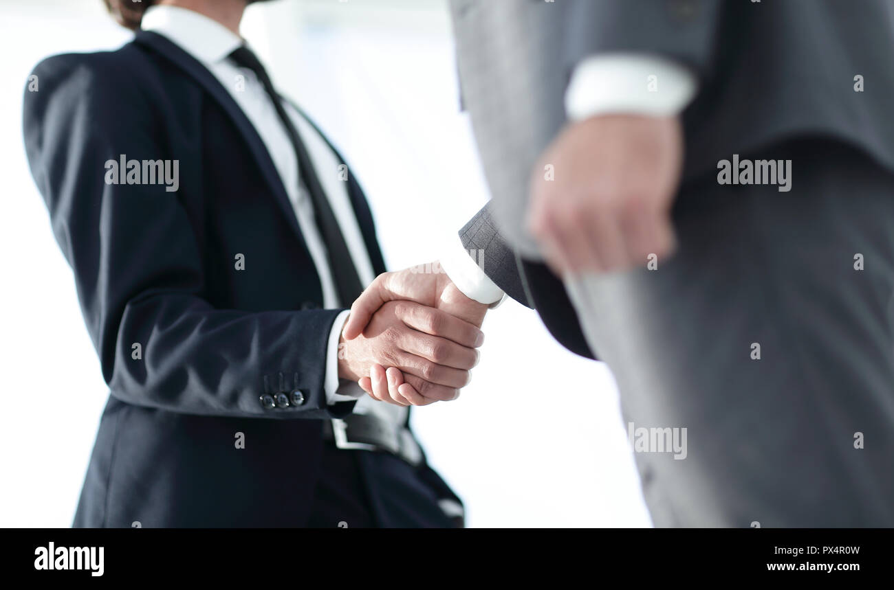 Business men giving a handshake. Business concept Stock Photo - Alamy