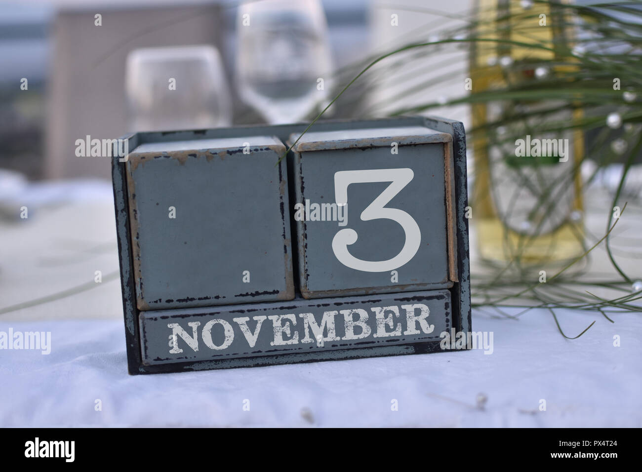 Wood blocks in box with date, day and month 3 November. Wooden blocks ...