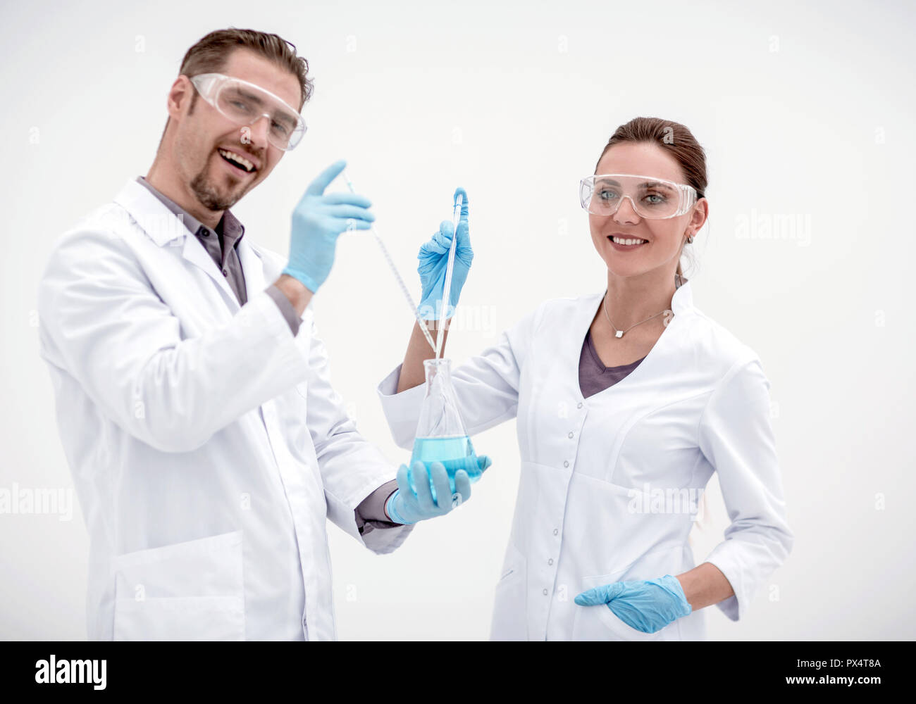 two cheerful scientists biologist on a light background.science and ...