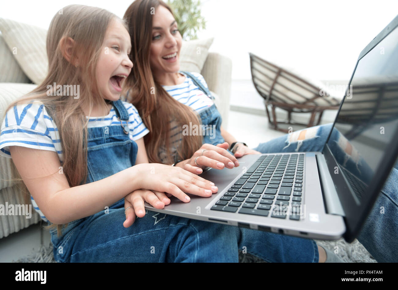 childhood, parenting and technology concept - happy mother with ...