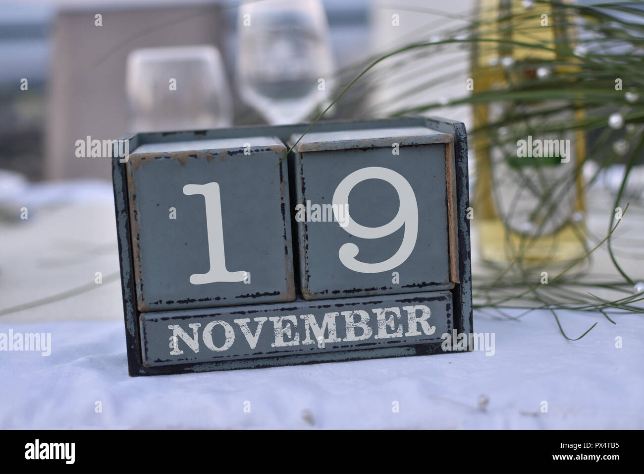 Wood blocks in box with date, day and month 19 November. Wooden blocks ...