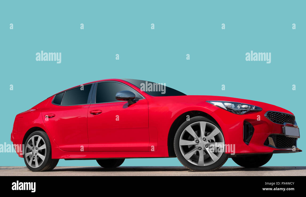 Red car on a blue background. Stylish, modern, bright image of the car ...