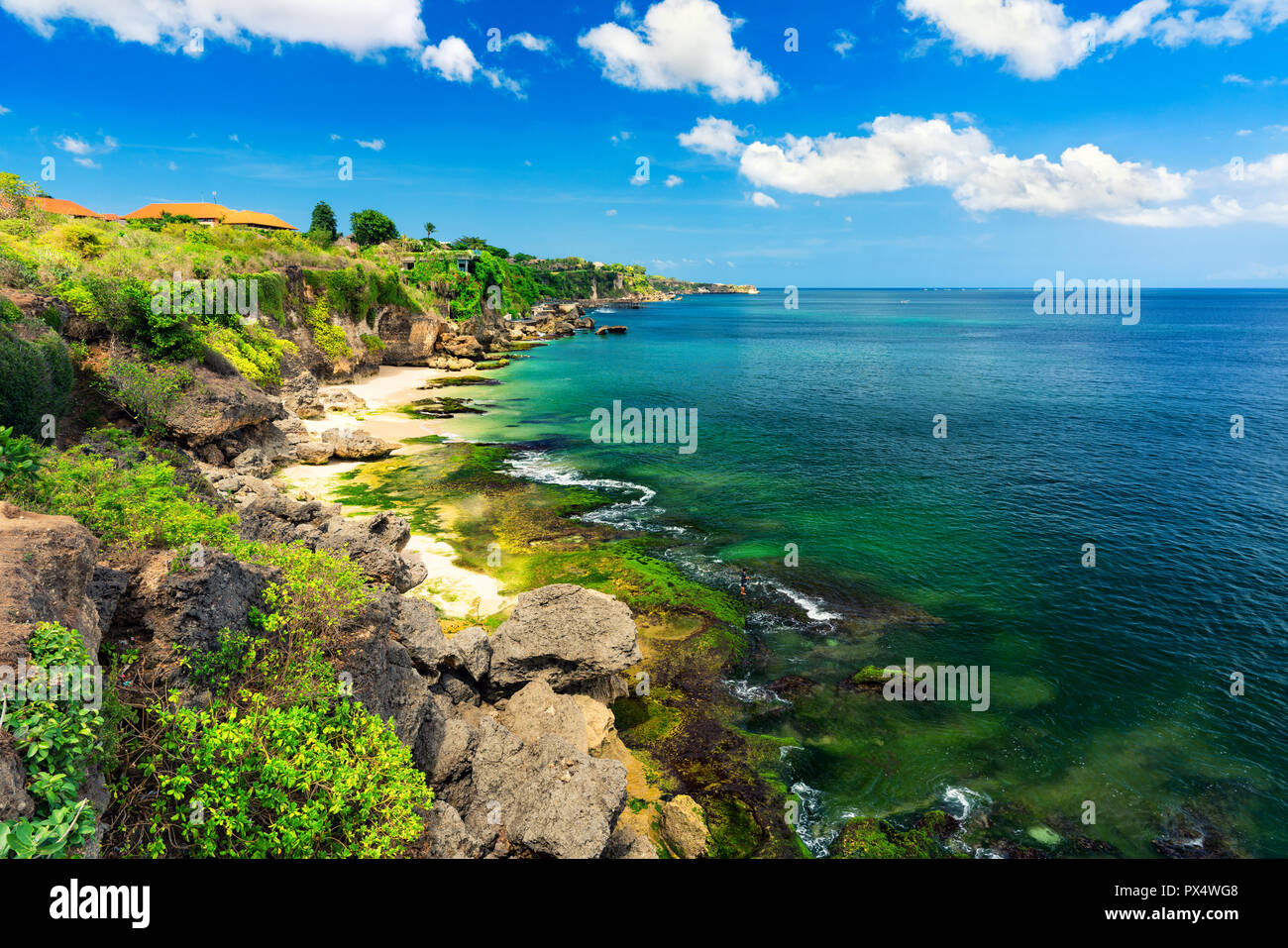 Bali seascape with huge waves at beautiful hidden white sand beach ...