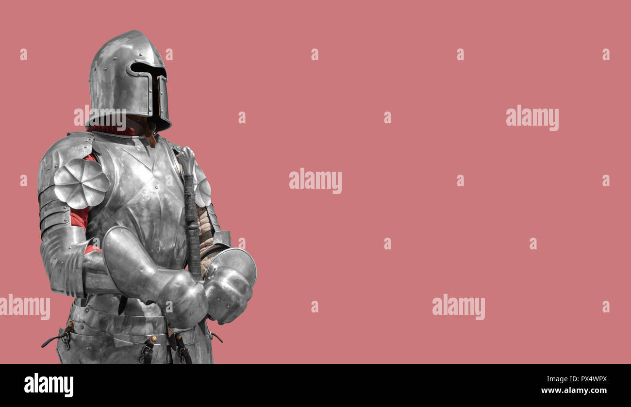 Medieval knight in shiny metal armor on a creamy background Stock Photo ...