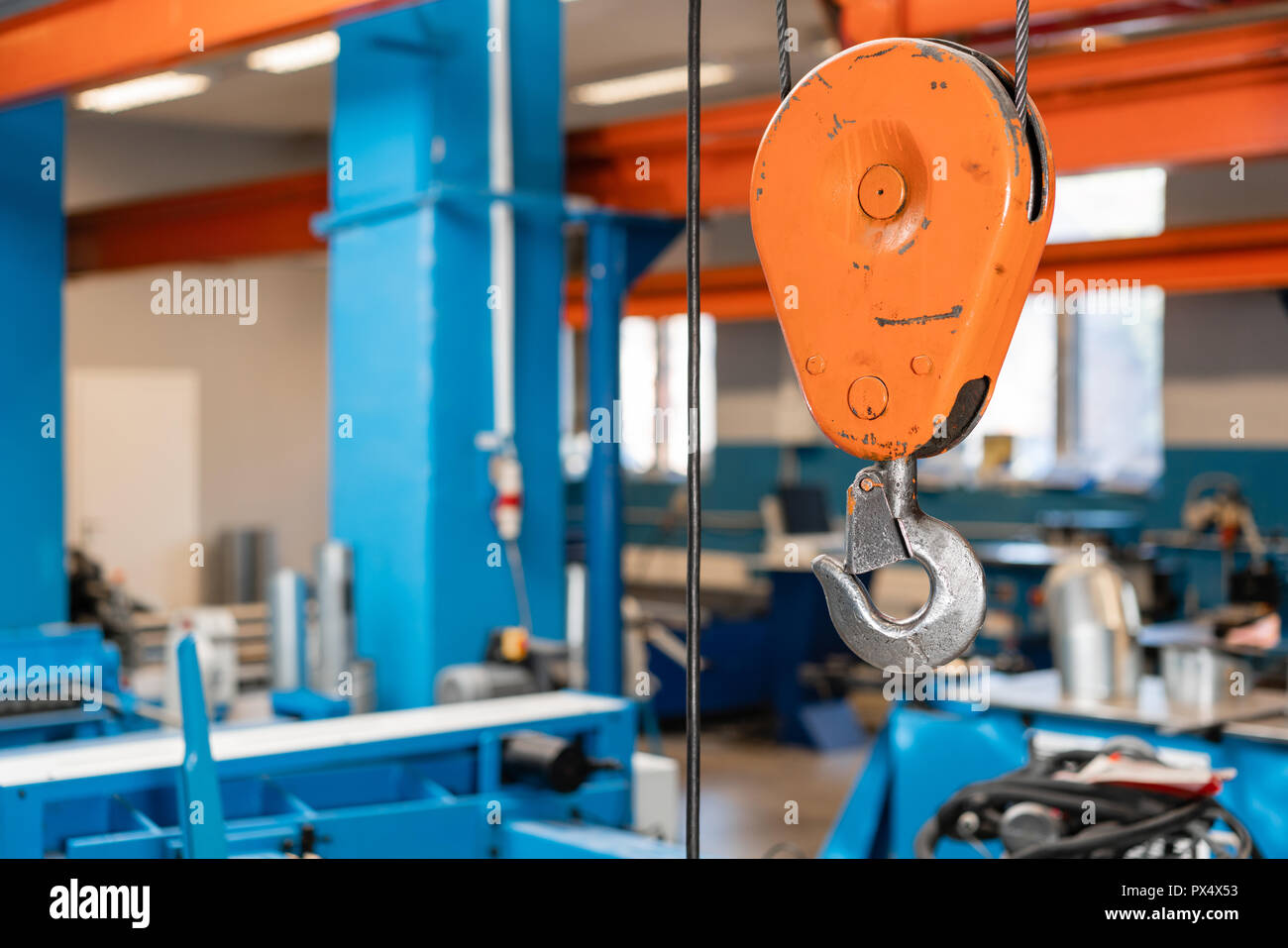 Crane hook. The system of pulleys and ropes, a hanging mechanism in the ...