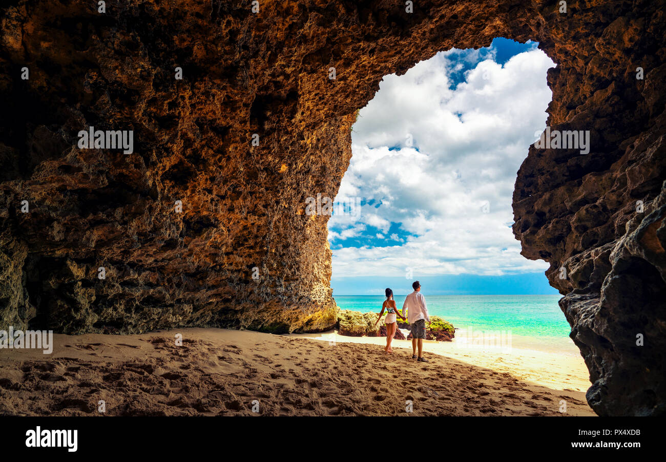 A Loving couple people enjoy honeymoon vacation on the tropical beach ...