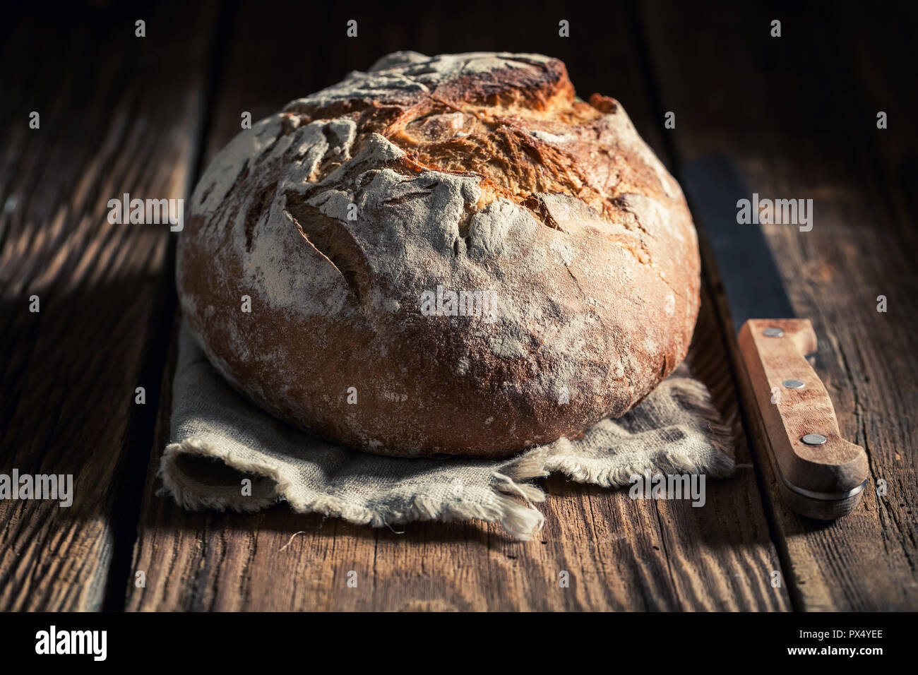 Healthy loaf of bread in rustic kitchen Stock Photo - Alamy