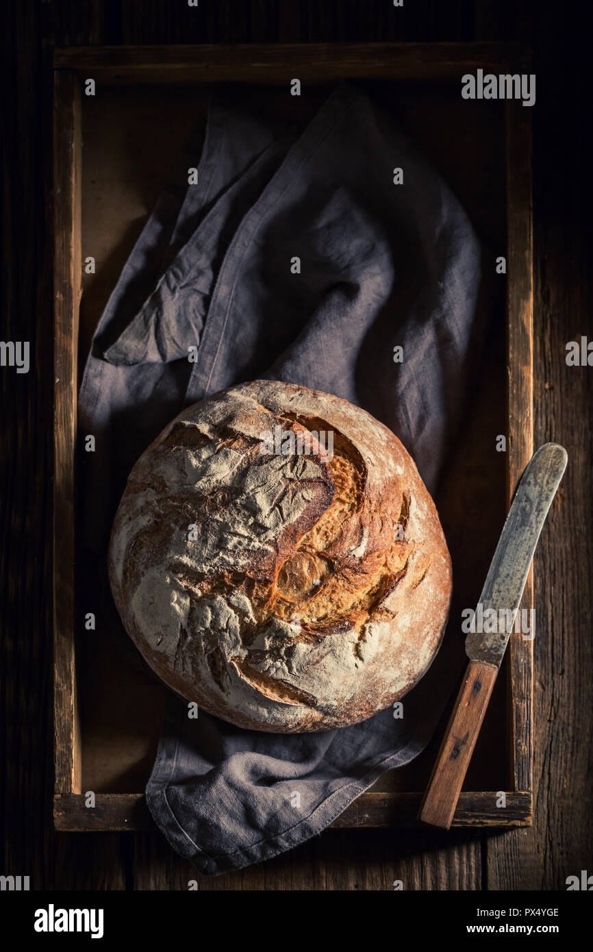 Healthy loaf of bread with blue rubber Stock Photo - Alamy