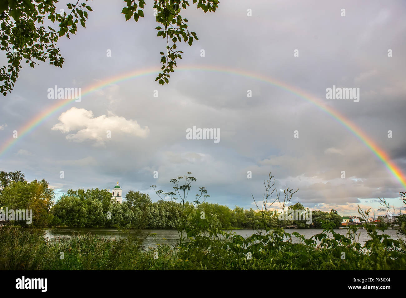 Rainbow over the river hi-res stock photography and images - Alamy