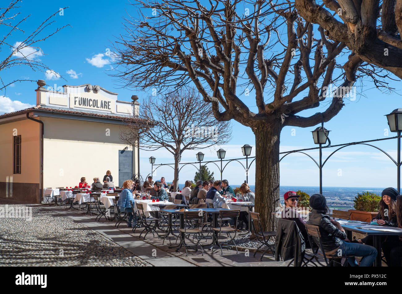 Bergamo, Italy - March 7, 2017: Tourists sitting in a bar restaurant on ...