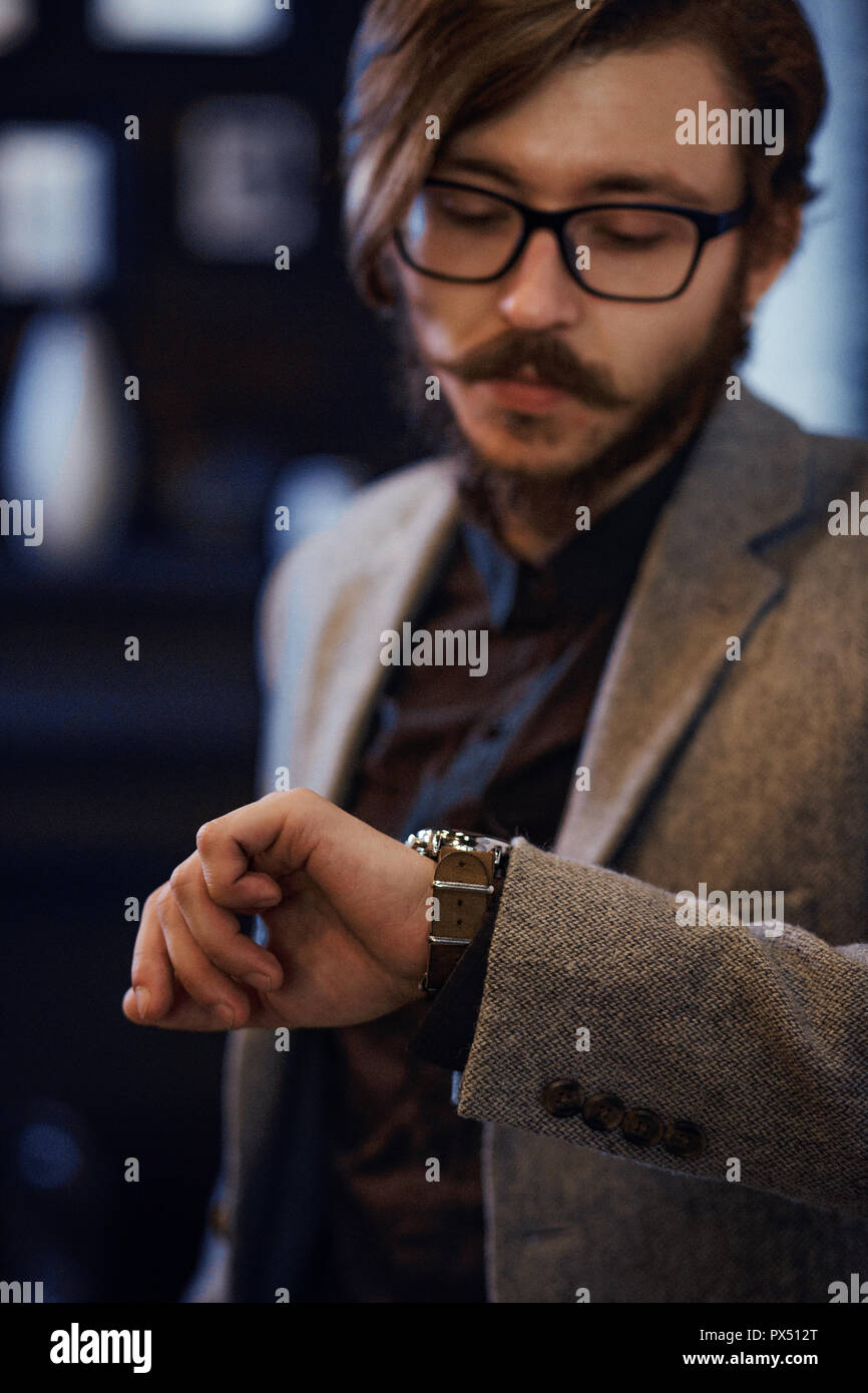 Male watching time on hi-res stock photography and images - Alamy