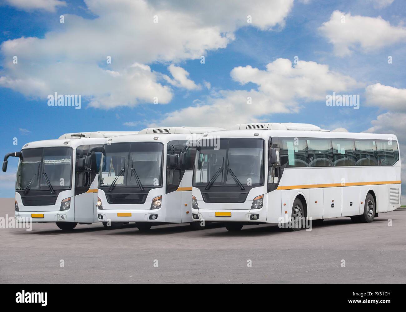 big tourist buses on parking Stock Photo - Alamy