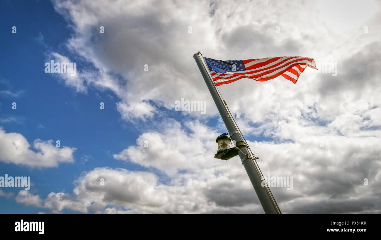 American flag flying above flag hi-res stock photography and images - Alamy