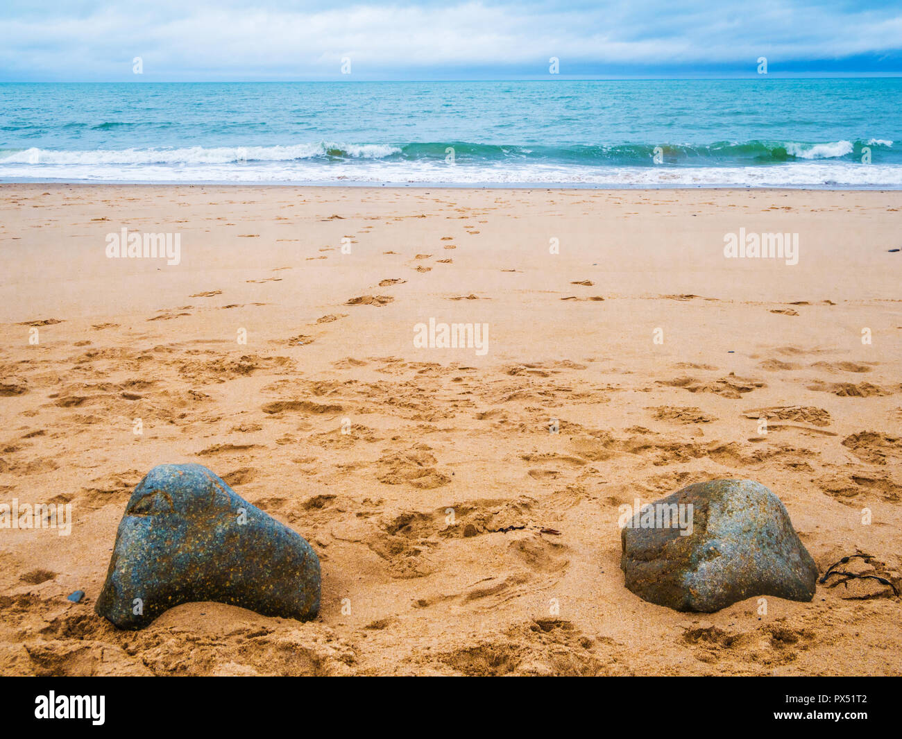 Footprints near rocks on beach hi-res stock photography and images - Alamy