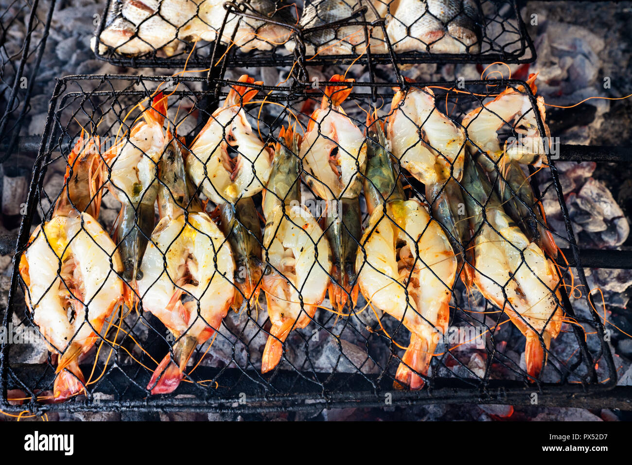 BBQ SeaFood: Grilled king size prawns on fire Stock Photo - Alamy