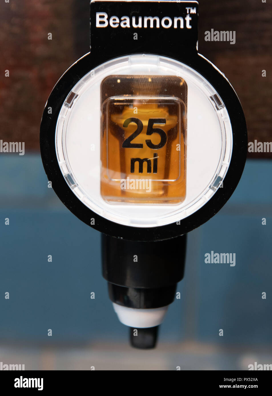 A 25ml spirit measurement seen in a pub bar in the UK Stock Photo - Alamy