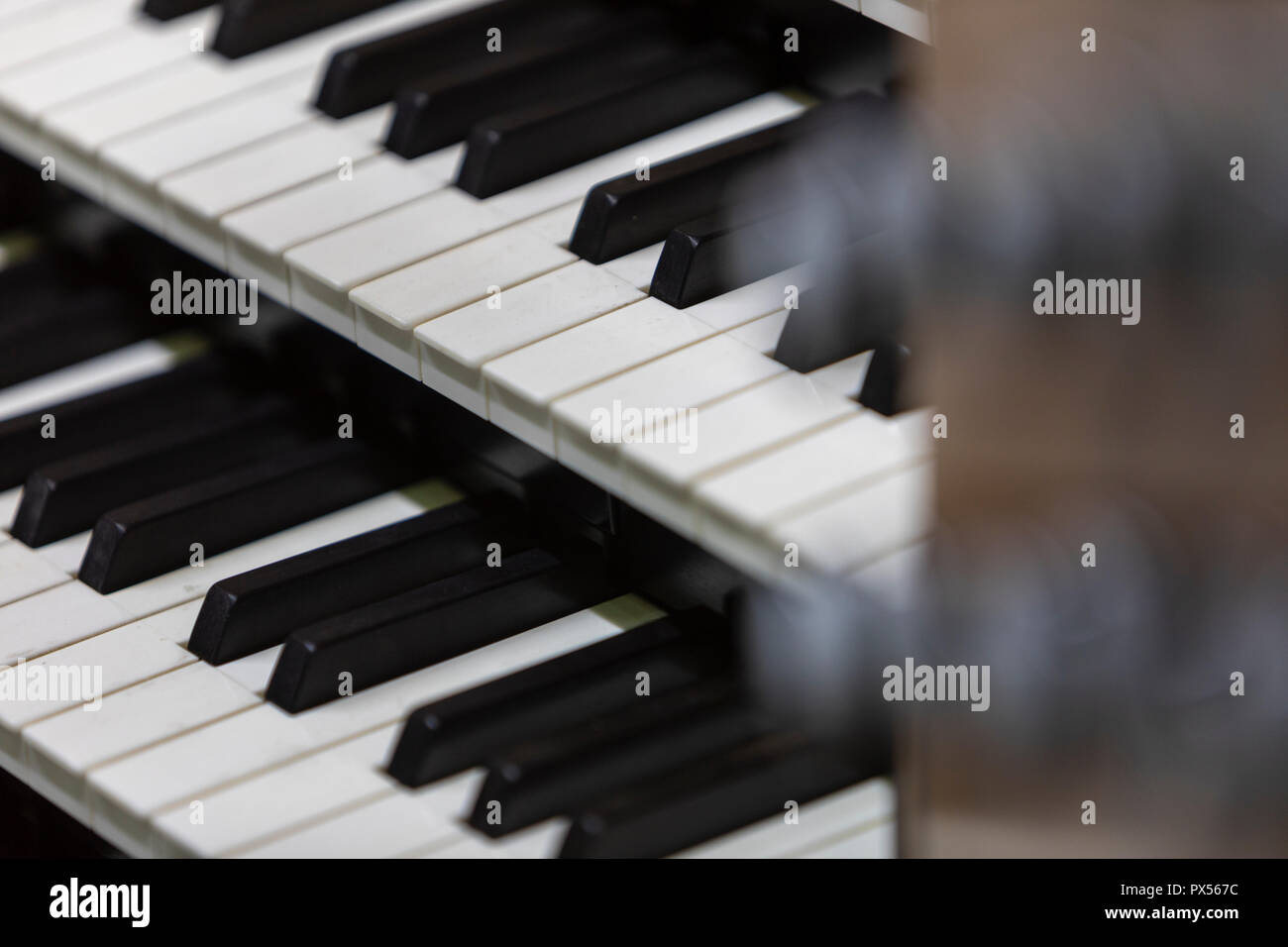 Two organ manuals with black and white keys Stock Photo - Alamy